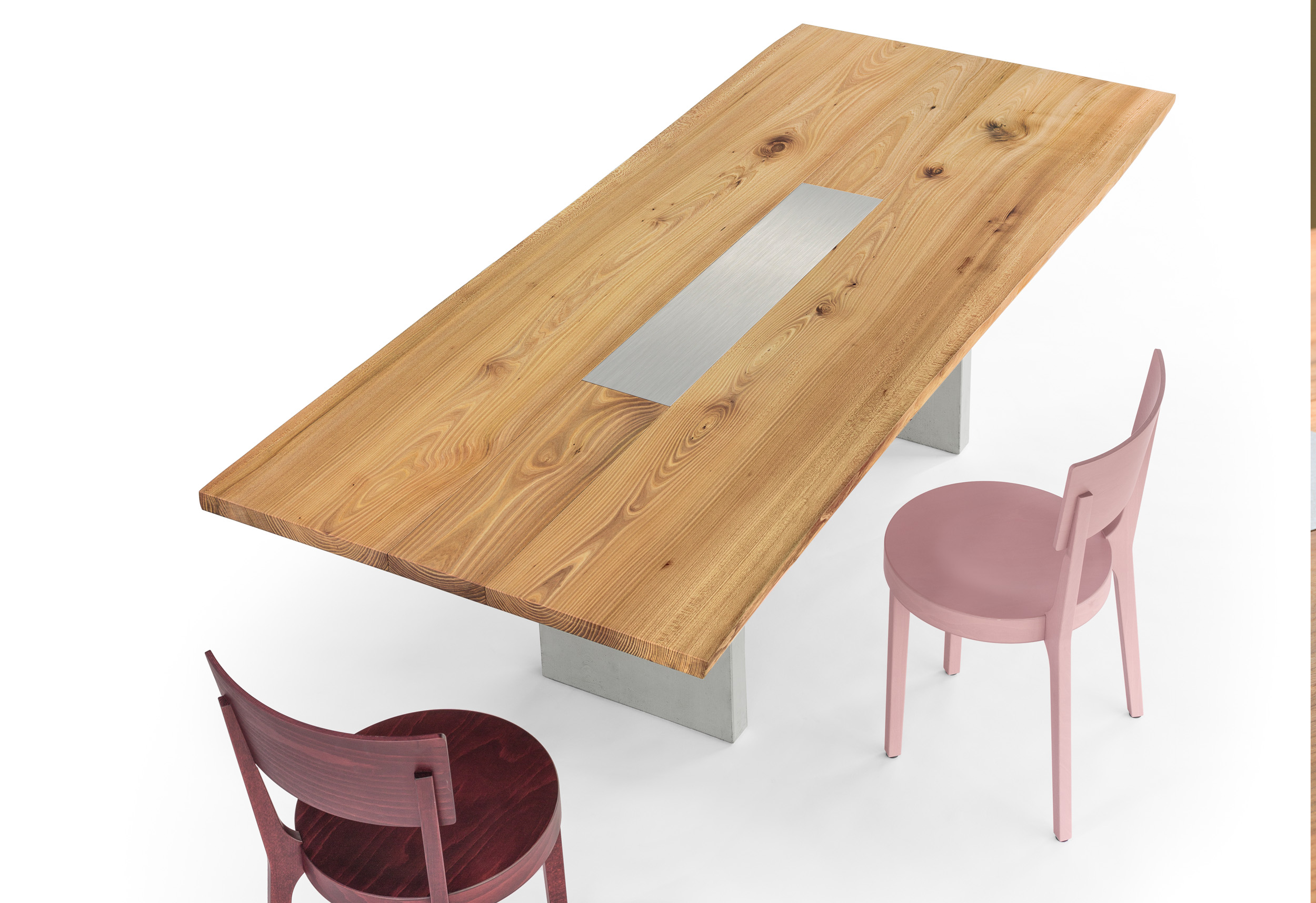 Nur – a dining table on a concrete base